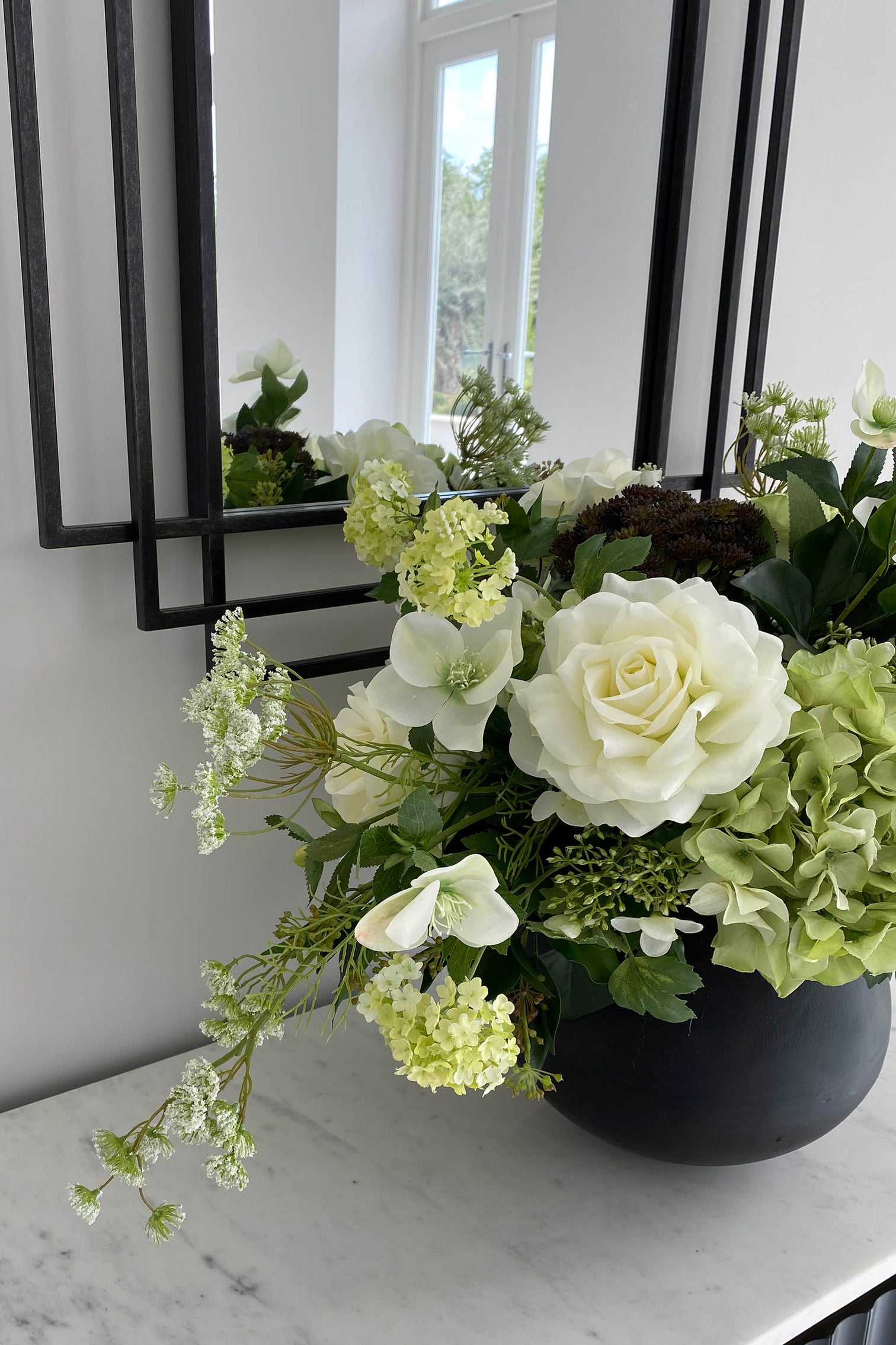 Hellebores, Roses and Snowball in a Black Metal Vase – RTfact Flowers