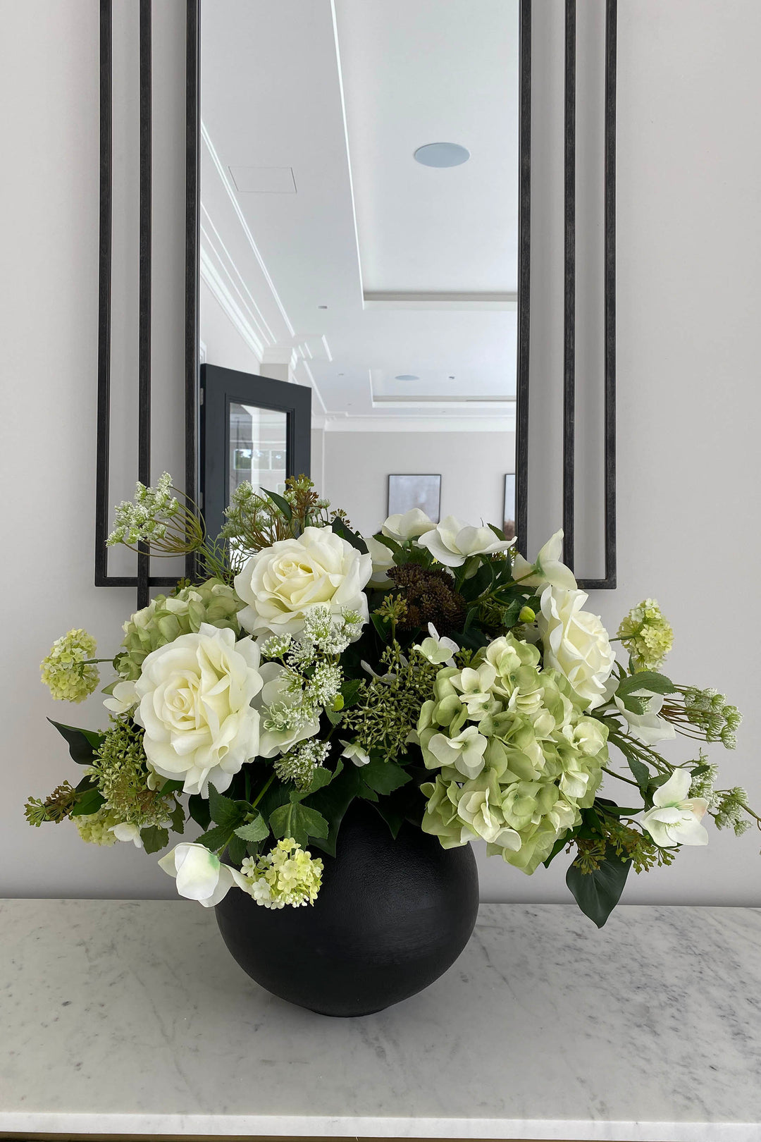 Hellebores, Roses and Snowball in a Black Metal Vase – RTfact Flowers